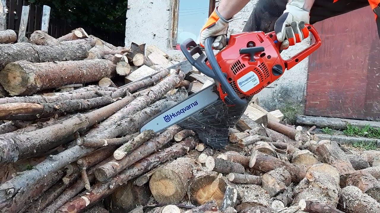 Cutting wood with sharpened chain saw with OREGON leash , Husqvarna 120 ...