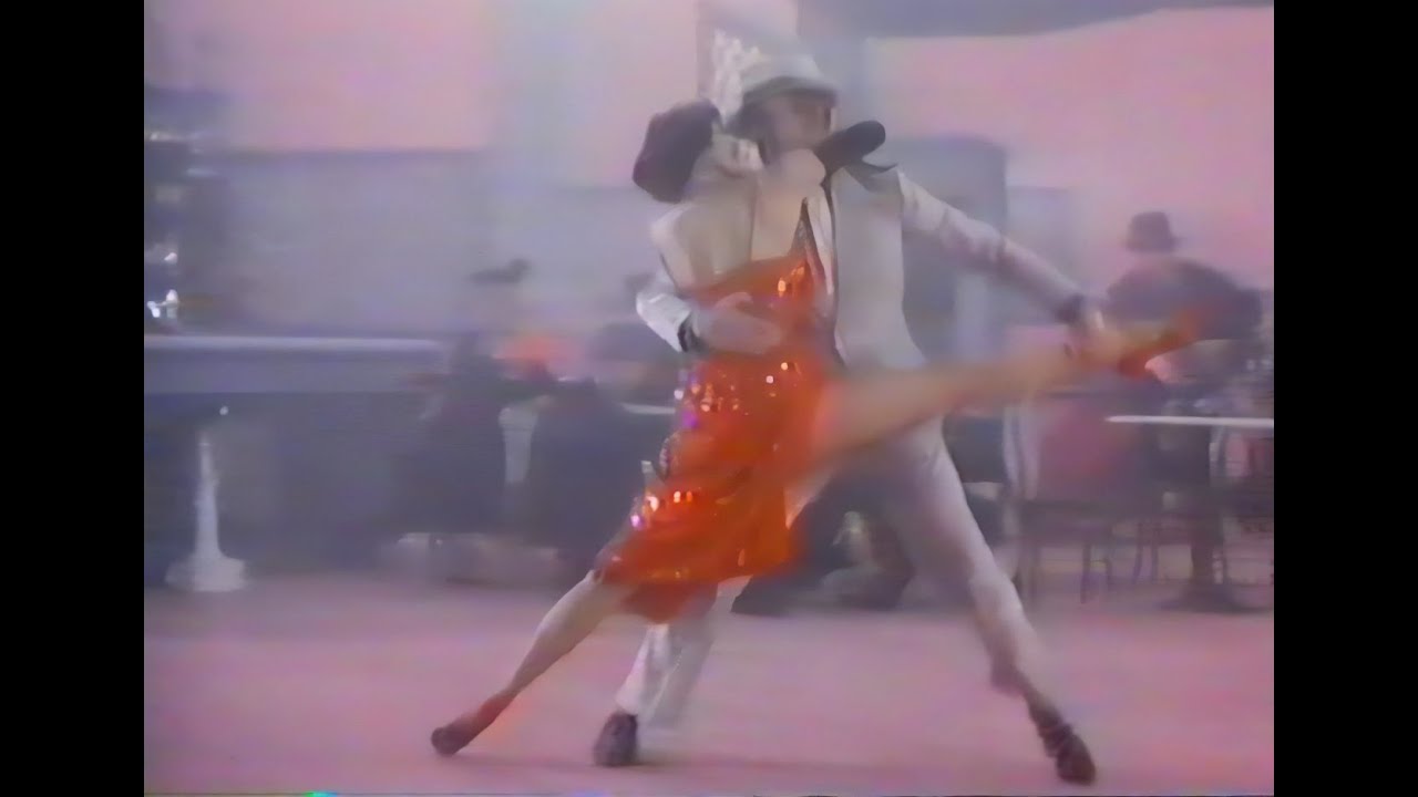 Man is pulling GIRL in SPLITS, exposing her smooth, FLEXIBLE long limber LEGS in revealing red ...