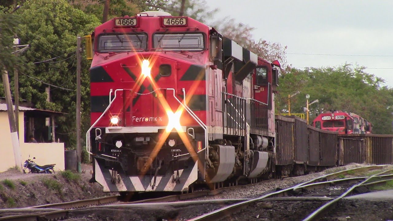 La locomotora diabolica de FXE 4666 liderando un tren con DPU! Y un borracho alegando en las ...