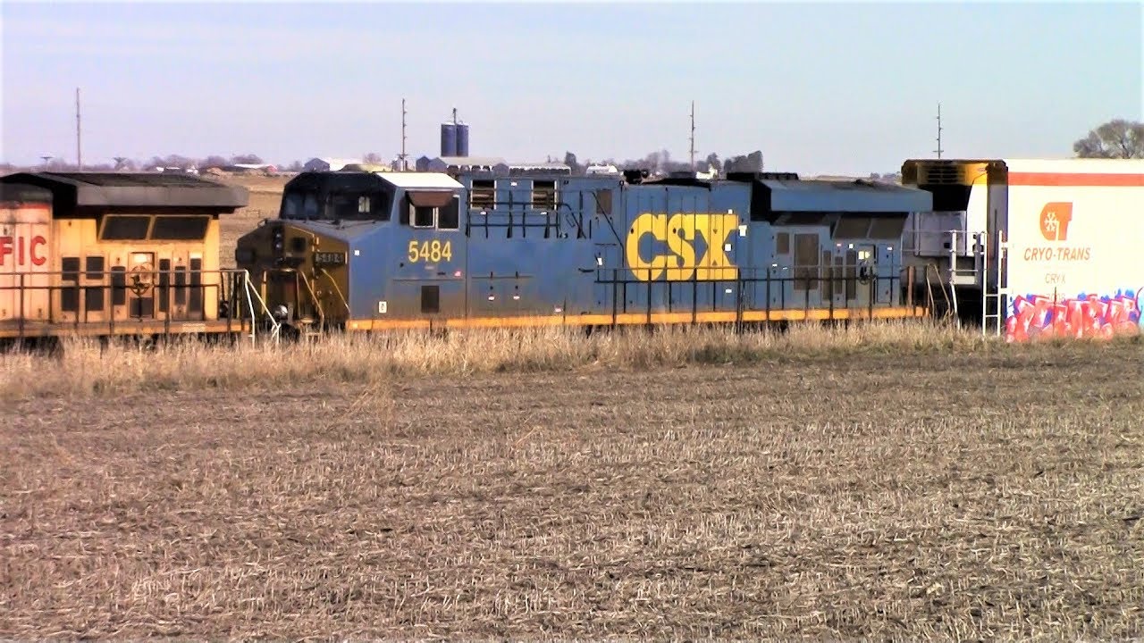UP manifest with CSX unit trailing passes the Colo Bogs - YouTube