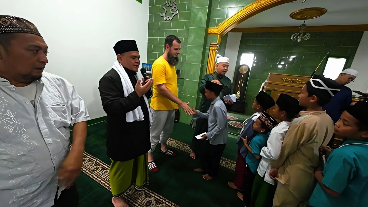 Visiting Orphans and the Mualaf Centre - YouTube