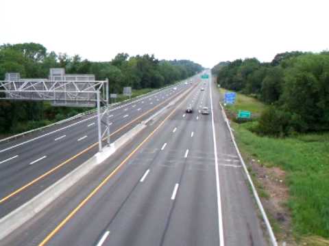 CSX train crossing the New York state Thruway - YouTube