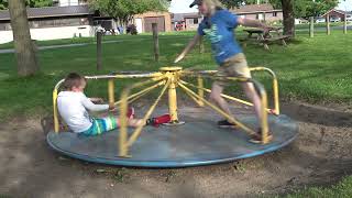 Merry-go-round, Spinner, Roundabout or Carousel, is a Popular Playground Fixture Loved by Daredevils