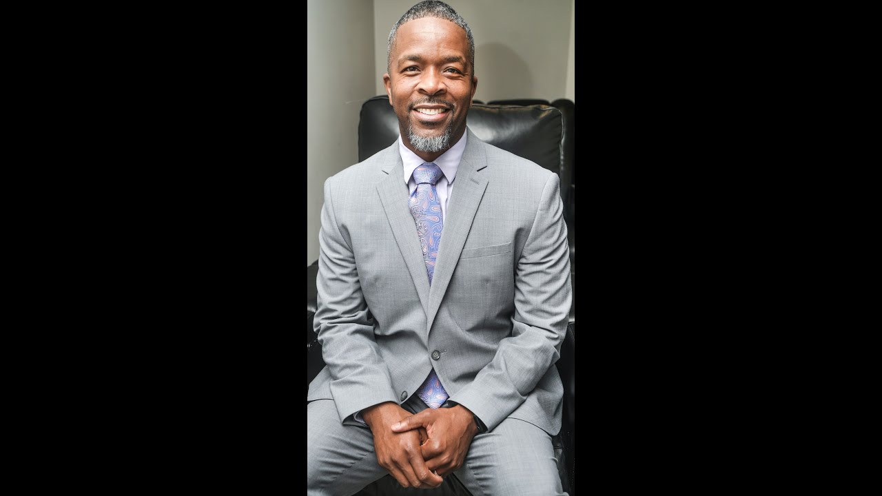 Baraboo Superintendent Rainey Briggs reacts to a parent pushing him at ...