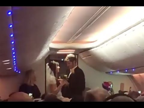 Couple Exchange Wedding Vows in the Middle of a Southwest Flight with the Pilot Serving as the