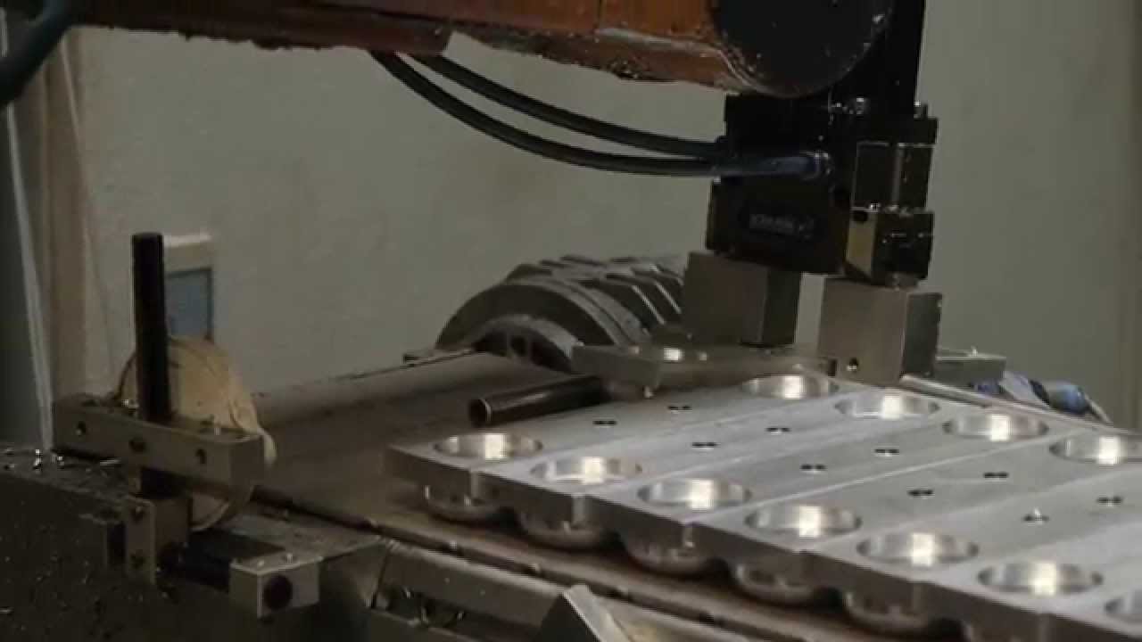 Robby - an ASEA IRB 6 Robot working at Dirk Benfer CNC-Technik - YouTube