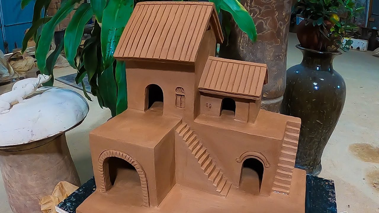 Two Story Clay Mini House With Many Beautiful Doors And Windows ...