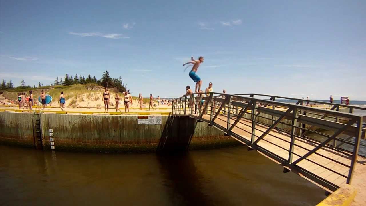 Double Backflip off Bridge (Basin Head P.E.I.) - YouTube