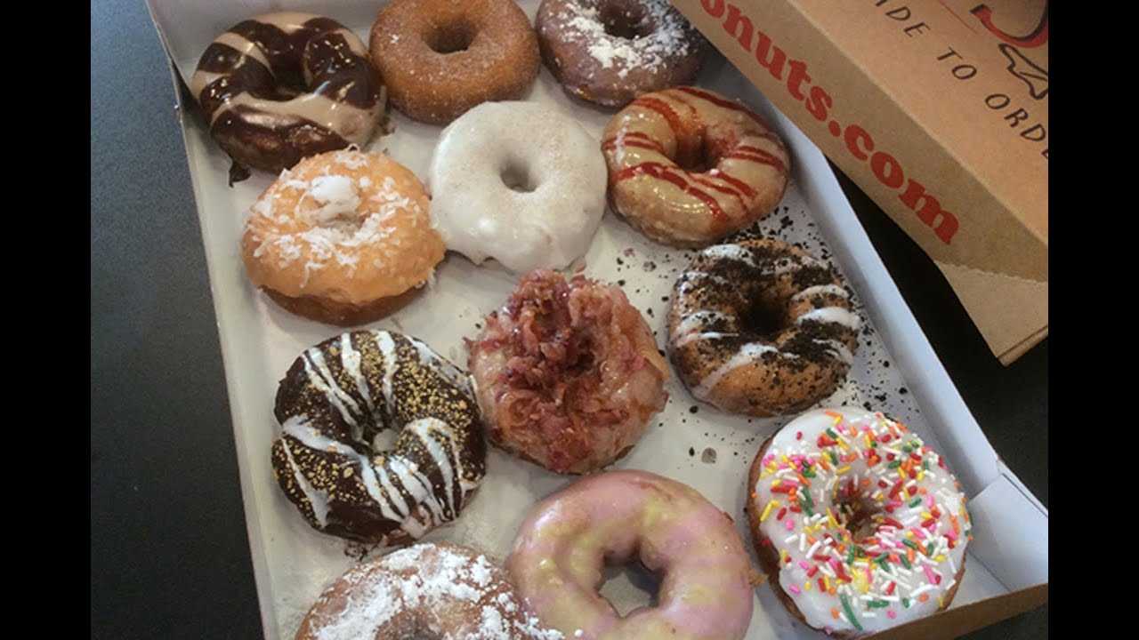 Duck Donuts: Customers add as many toppings and drizzles as they want ...