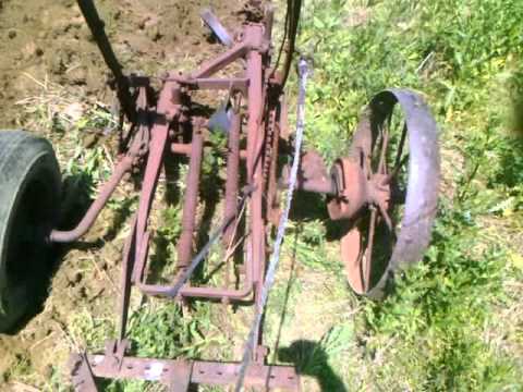 Plowing the garden with a Farmall M - YouTube