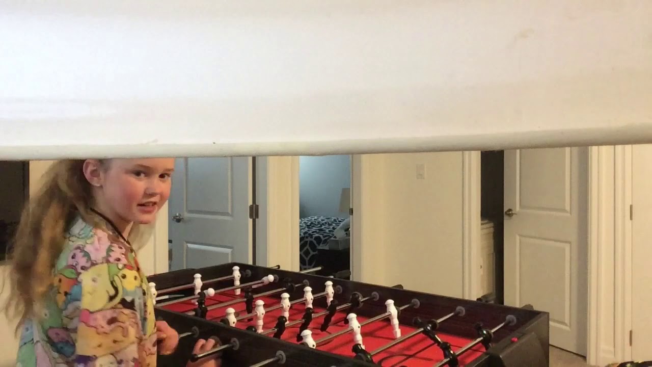 Playing foose ball - YouTube