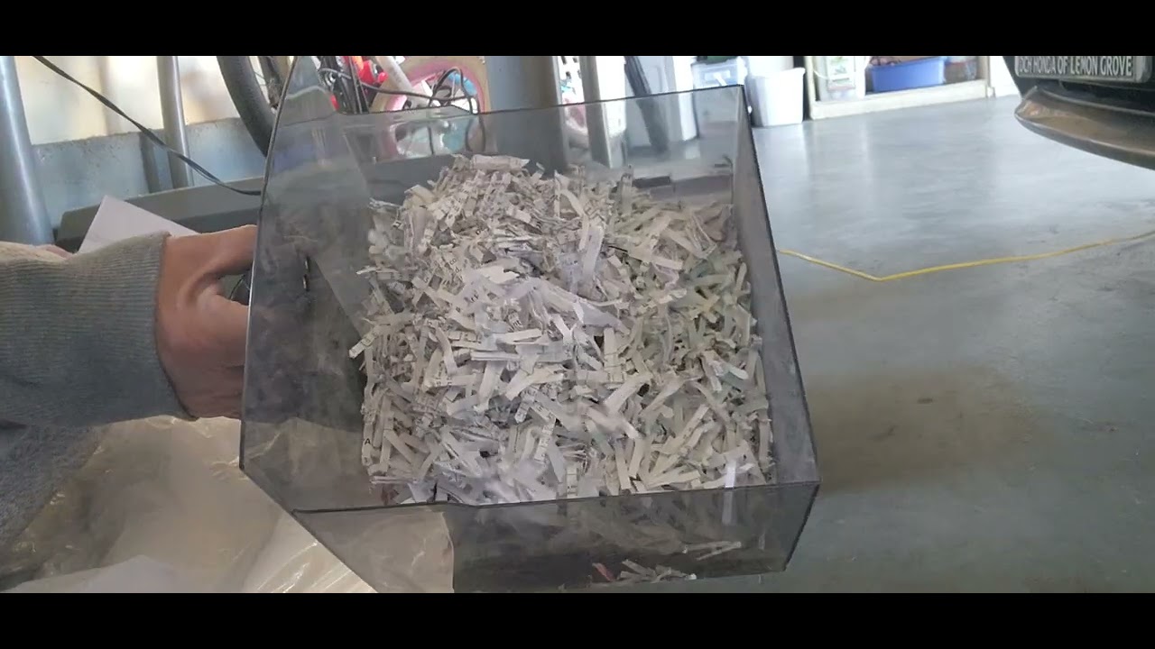 shredding papers - YouTube