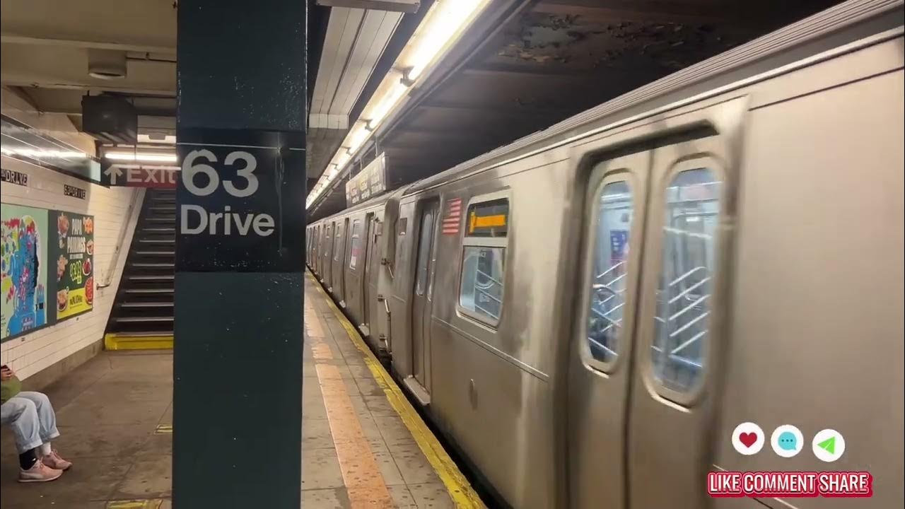 Manhattan bound R160A/B (E), (F), and (R) trains entering & leaving 63rd Drive–Rego Park, in ...