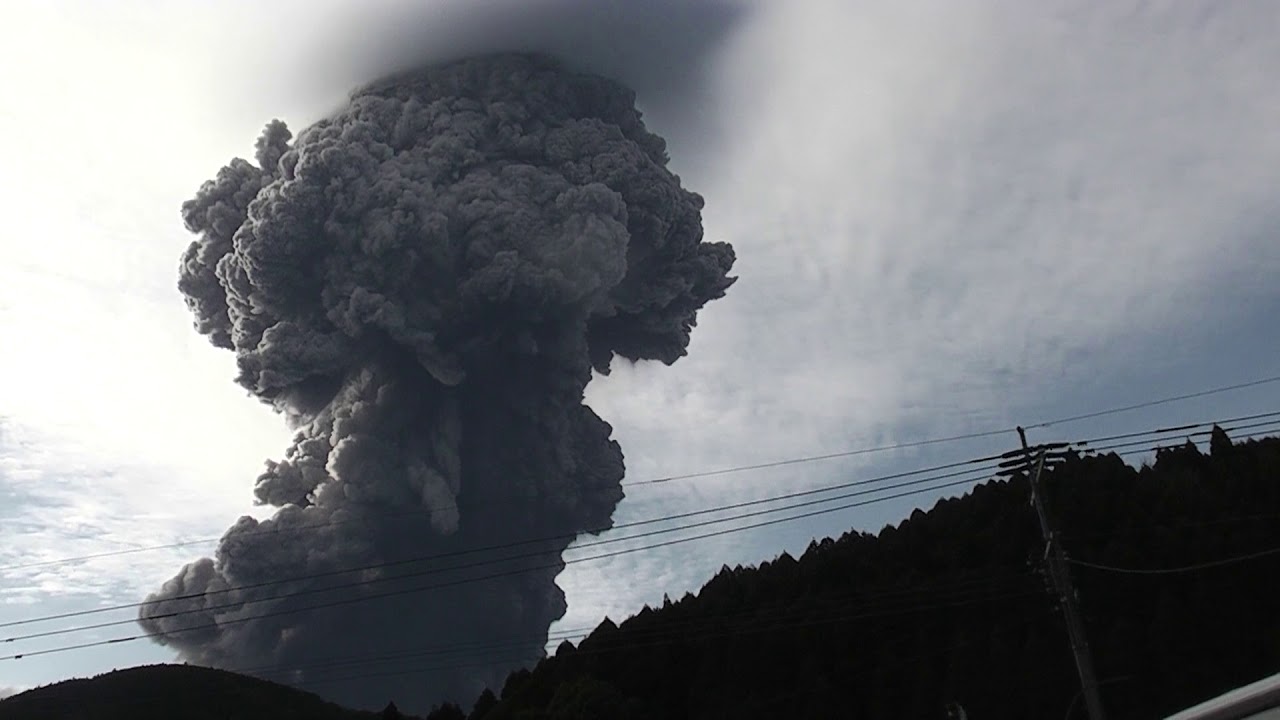 Volcanic plume rising through the clouds, the 2011 Shinmoedake eruption ...