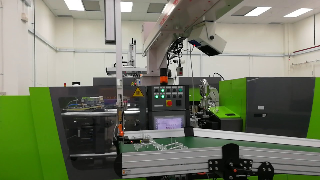 Automatic Injection Molding Machine DEMO - YouTube