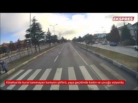 Kütahya'da kural tanımayan kamyon şöförü, yaya geçidinde kadın ve çocuğu eziyordu