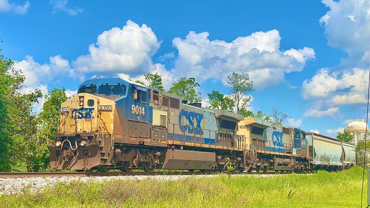 YN2 Dash 9 duo! CSX L738-11 with CSX CW40-9 9014 leading with an ...