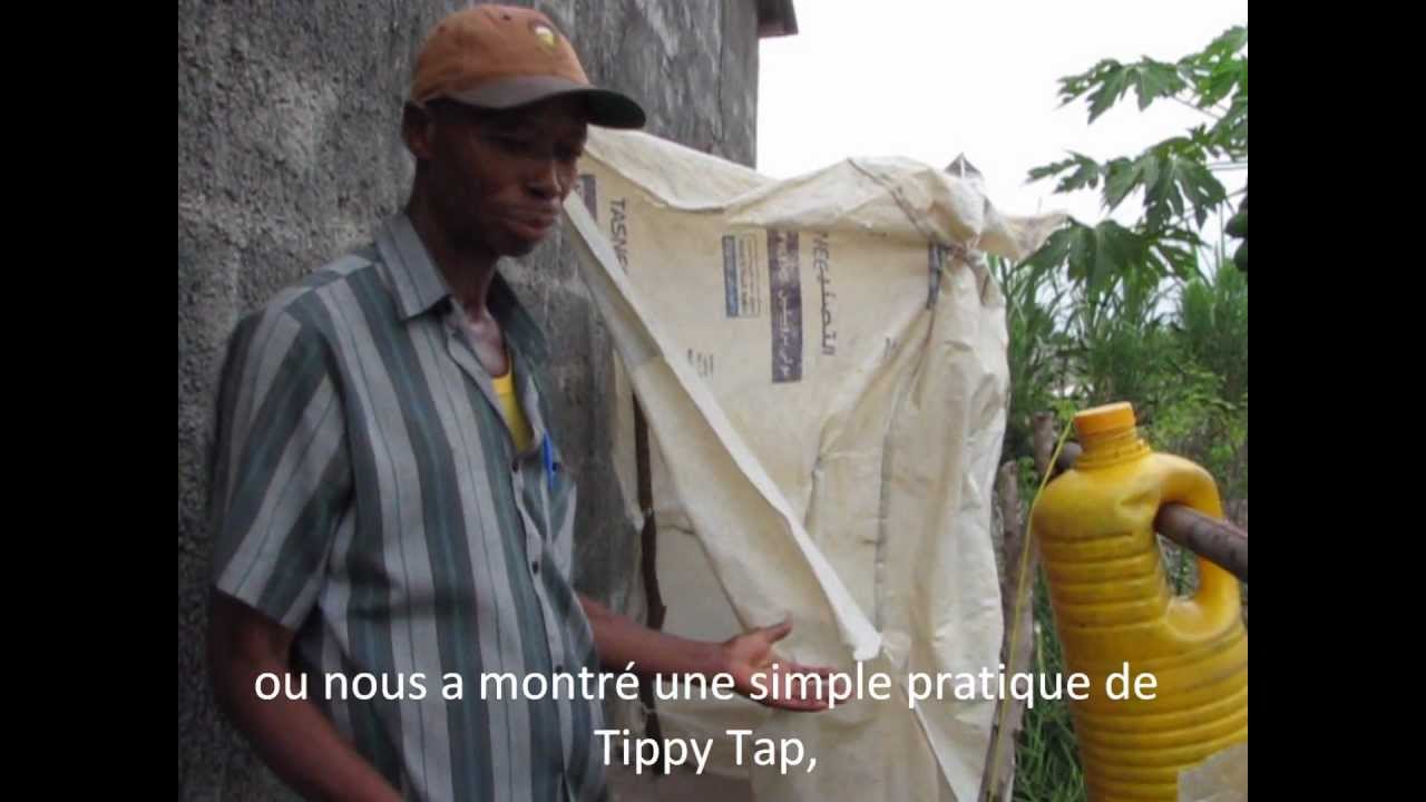 Démonstration du dispositif lave-main 'Tippy Tap' en RD Congo - YouTube