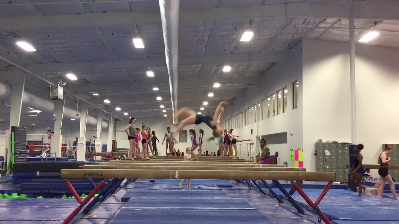 Back handspring layout step out - YouTube