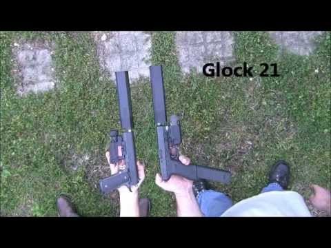Springfield operator 1911 vs Glock 21 with Silencerco ospreys - YouTube