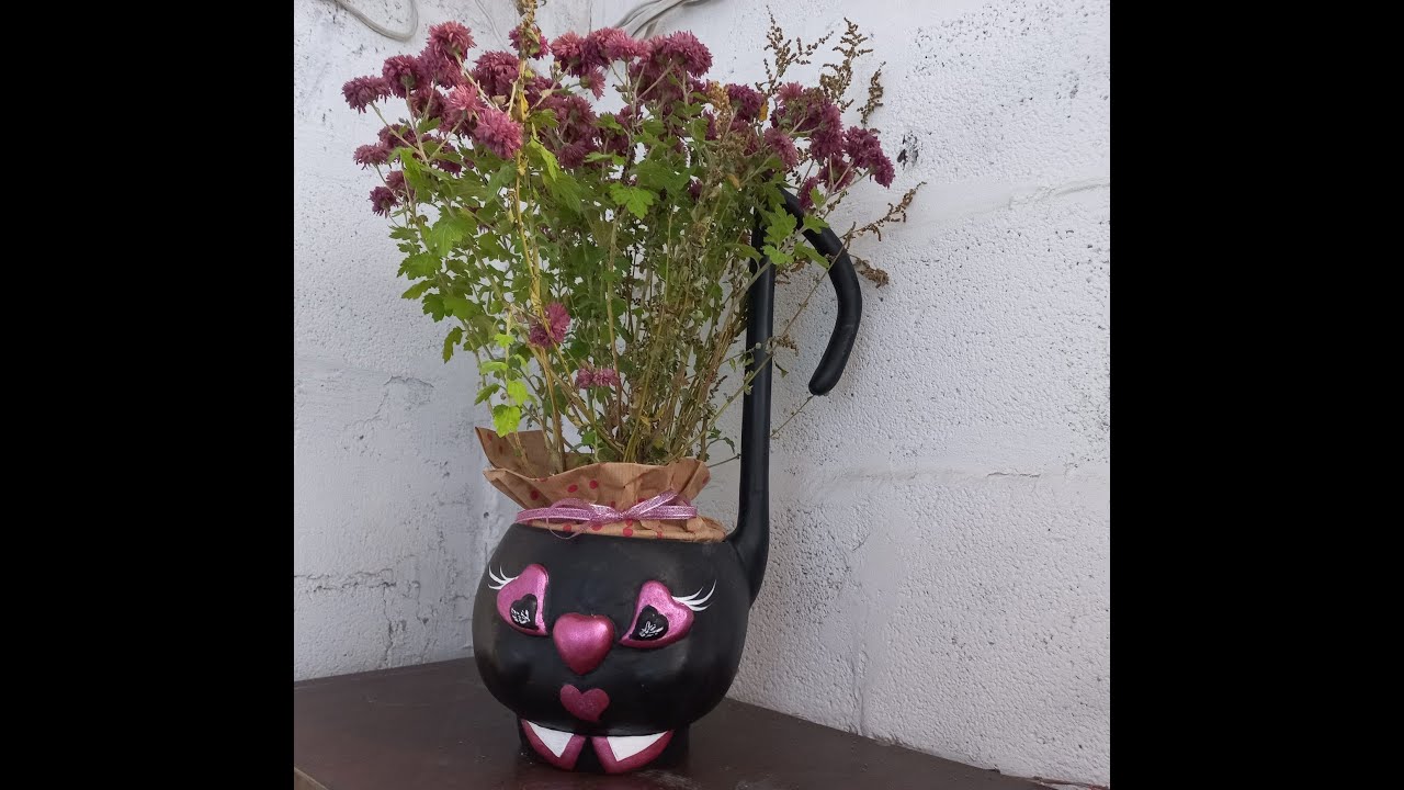 Beautiful Flower pot holder, in shape of a musical note, made from clay ...