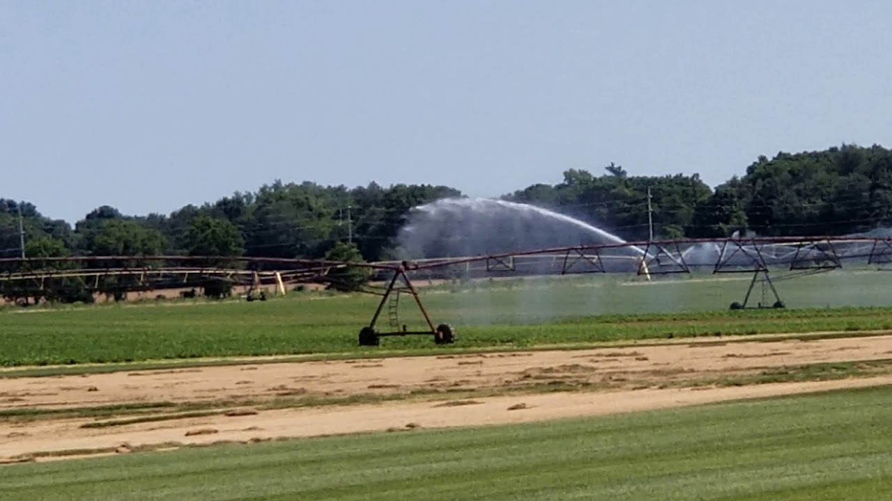 Old pivot with impacts and a stalled end gun - YouTube