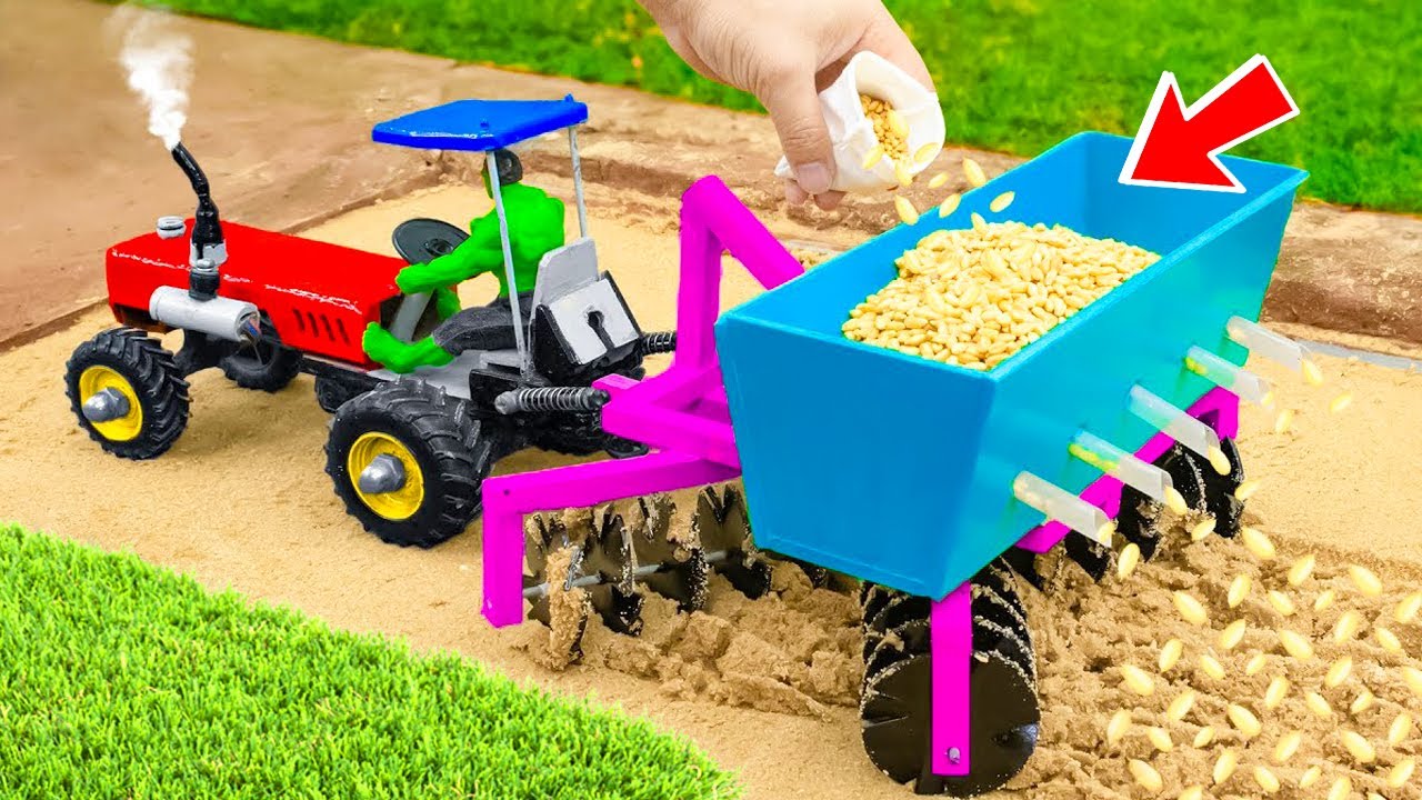 Diy tractor innovation: building an automatic seeding machine for efficient planting - YouTube