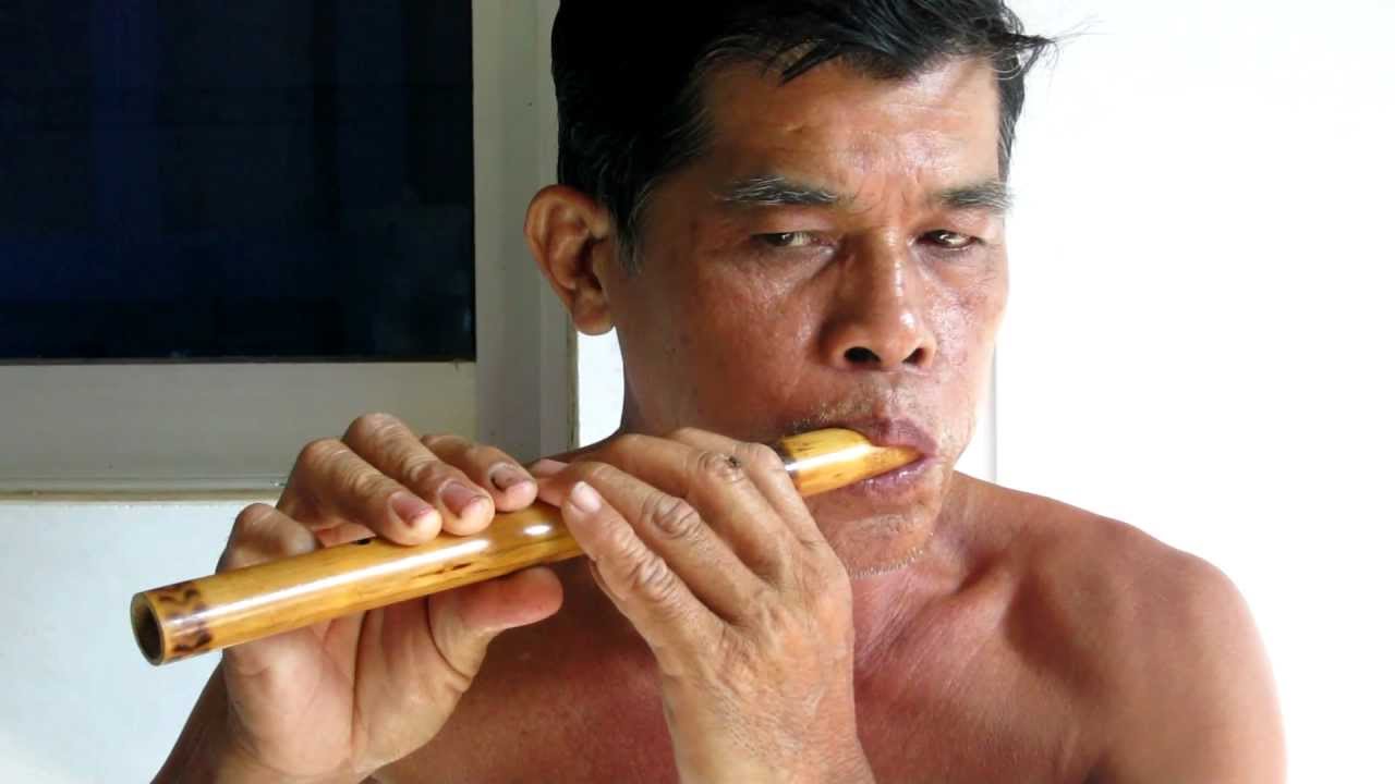 Khmer Rouge Survivor Plays Wooden Flute (1 of 2) - YouTube