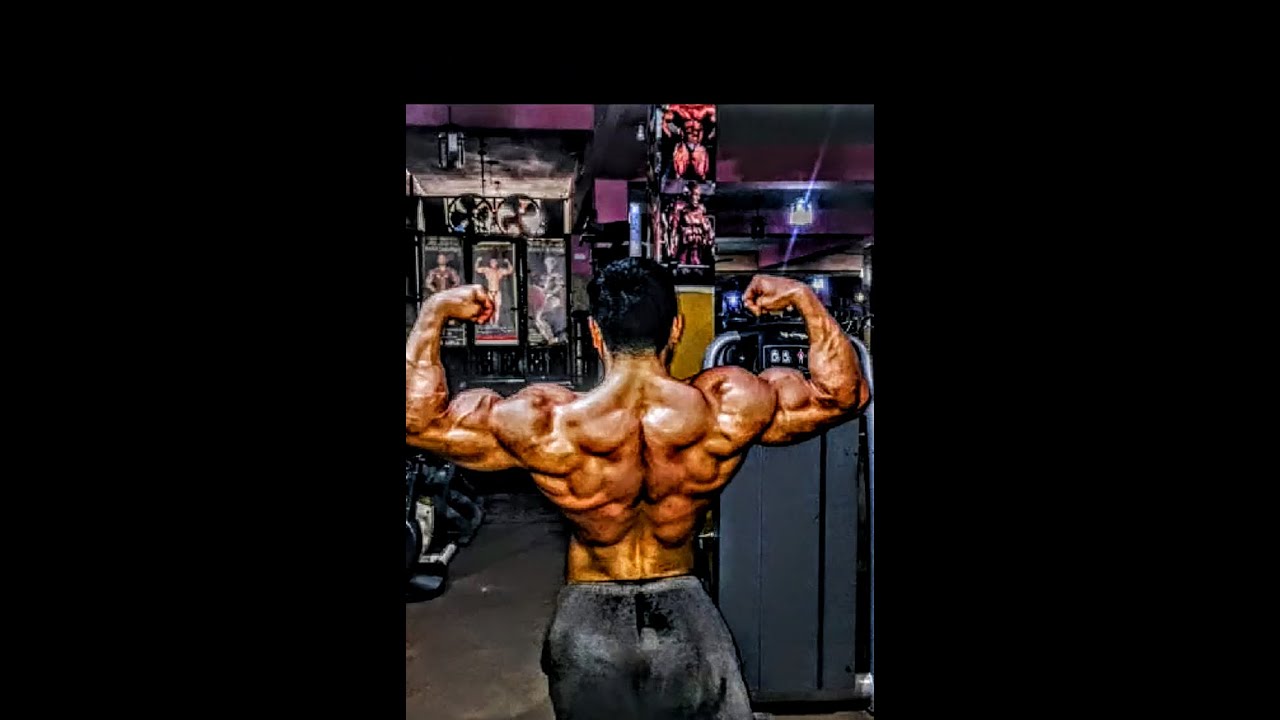 Momin khan MR.Pakistan doing some poses for Ajmal khan fitness channel ...