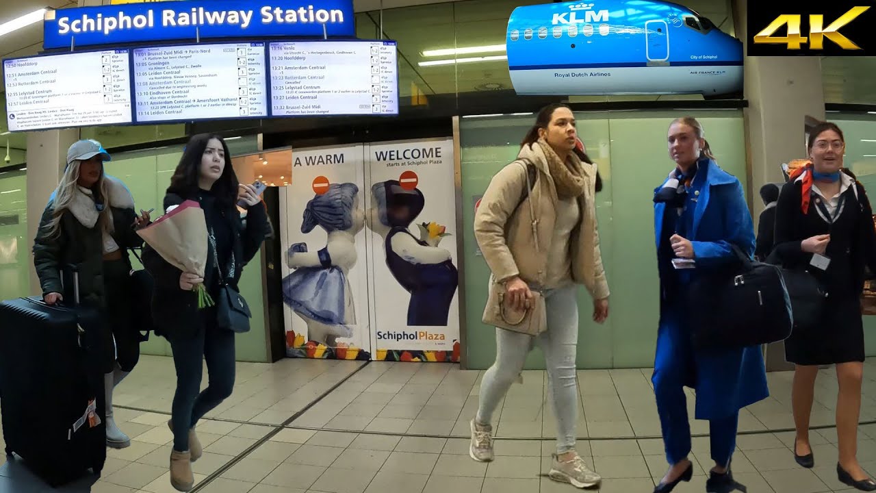 Amsterdam airport in 11 minutes. Schiphol train station and waking at ...