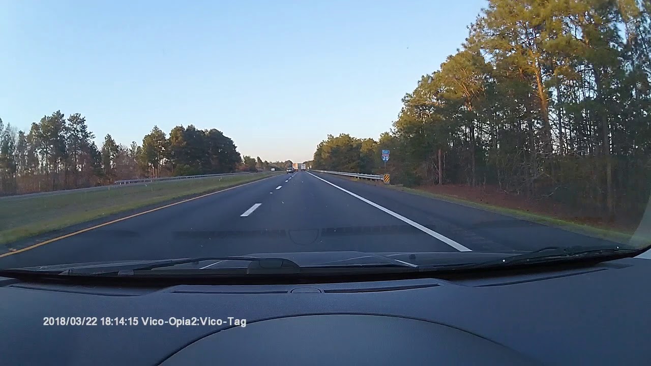 Slow truck pulling out in front of cars trying to pass another slow ...