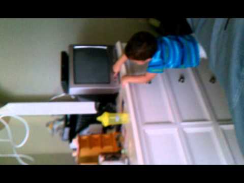 lucas messing with the tv - YouTube