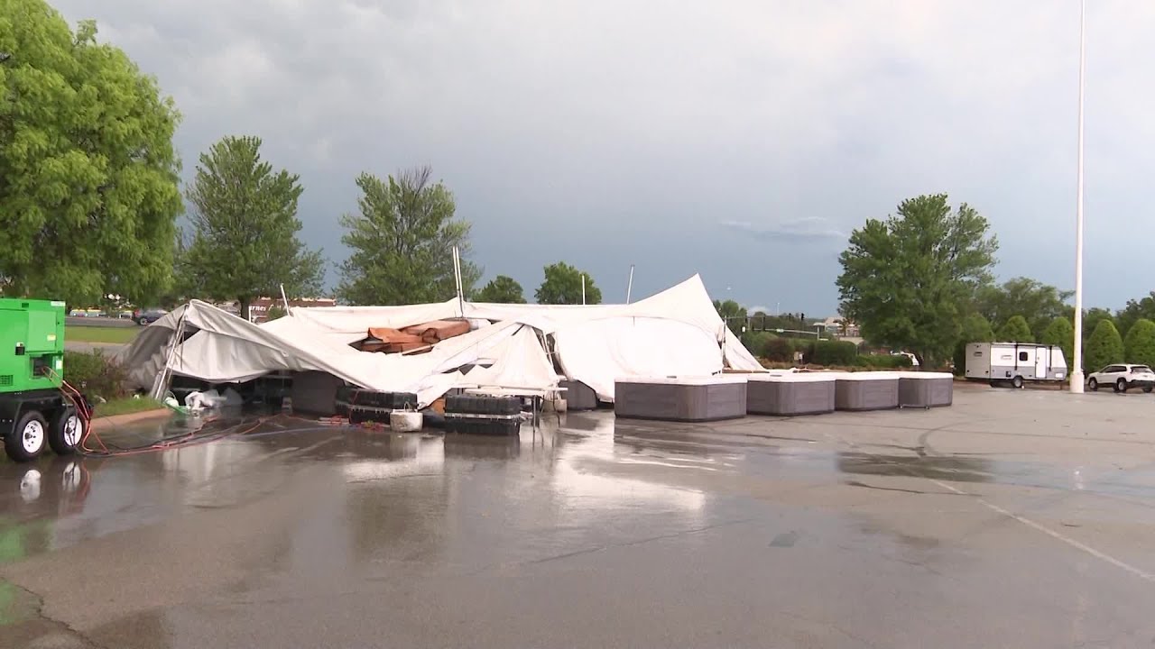 Morning storms damage tent at NWA Mall - YouTube