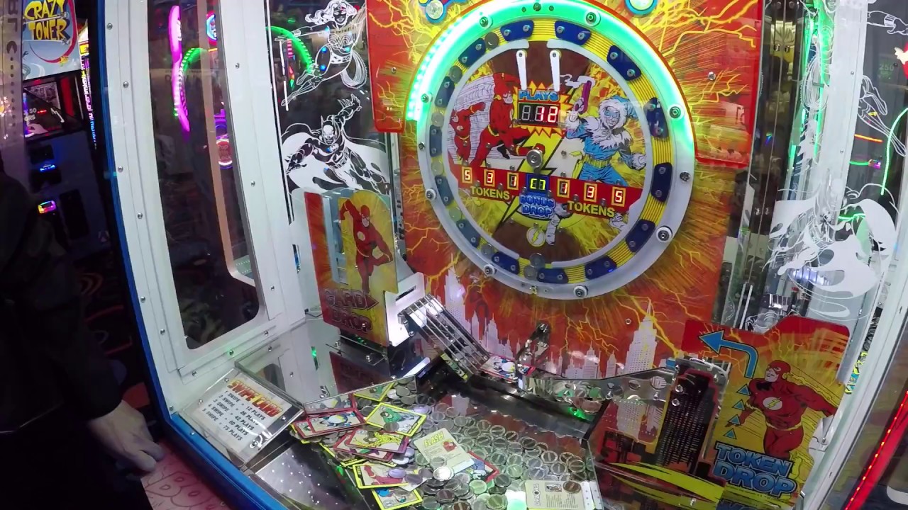 Pushing Coins around at Round 1 Arcade Coin Pusher - YouTube