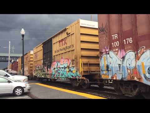 Long CSX Freight Train in a Storm (Recieves a Tornado Warning Notice ...