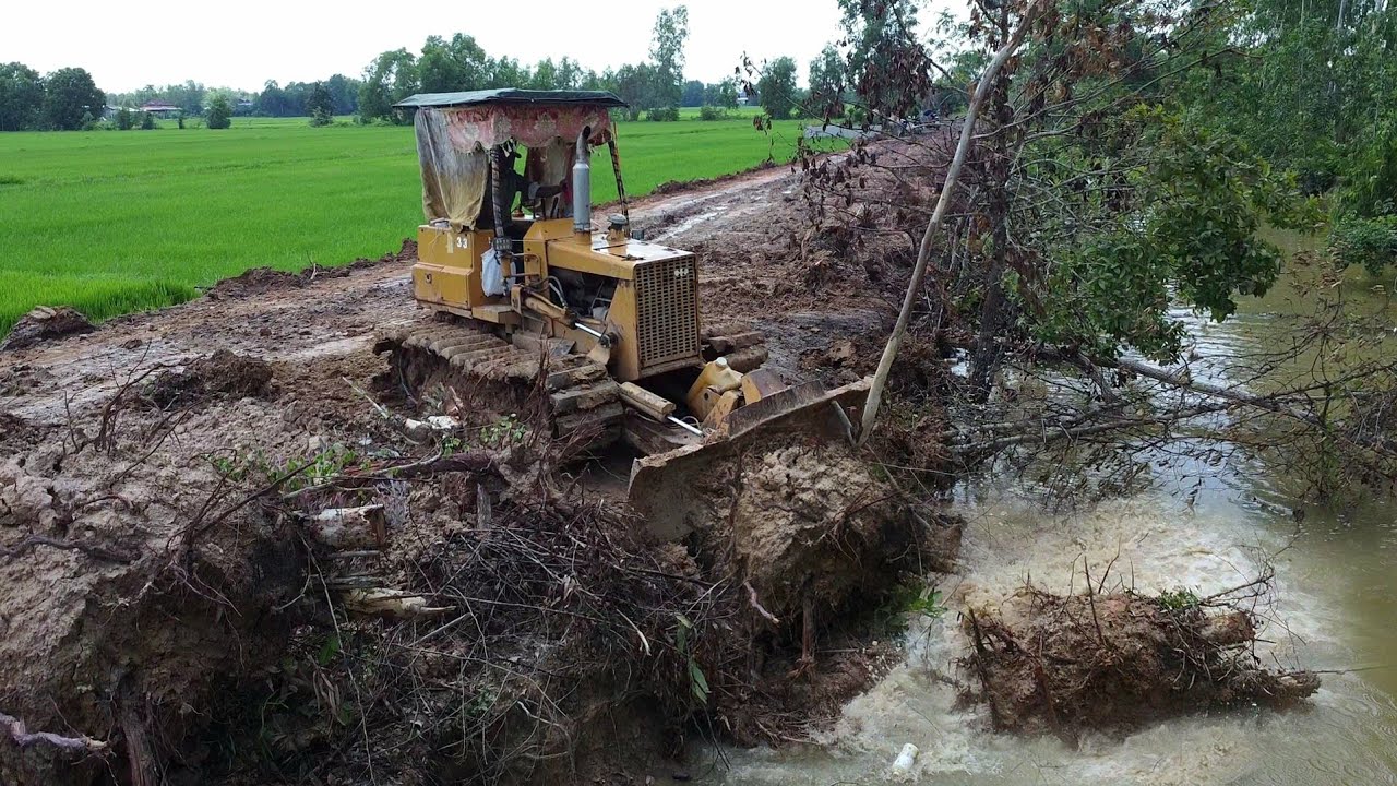 Wonderful!! Strong Bulldozer Pushing Soil Fall Into Canal Landslide ...