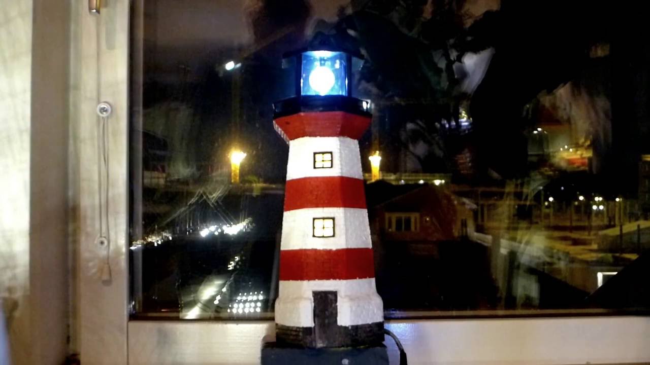 Lighthouse with moving light. - YouTube