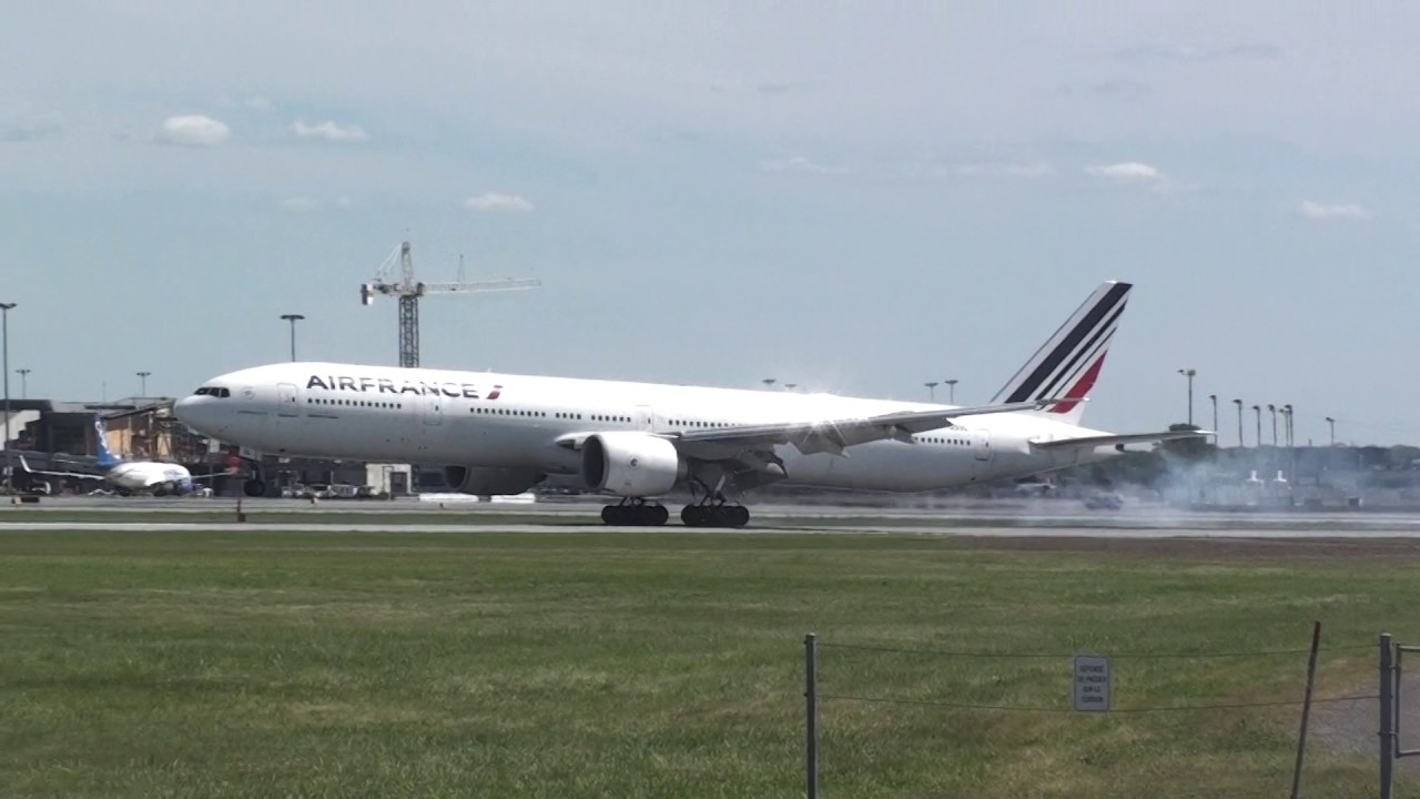 Air France B77W landing on 06L at YUL - YouTube