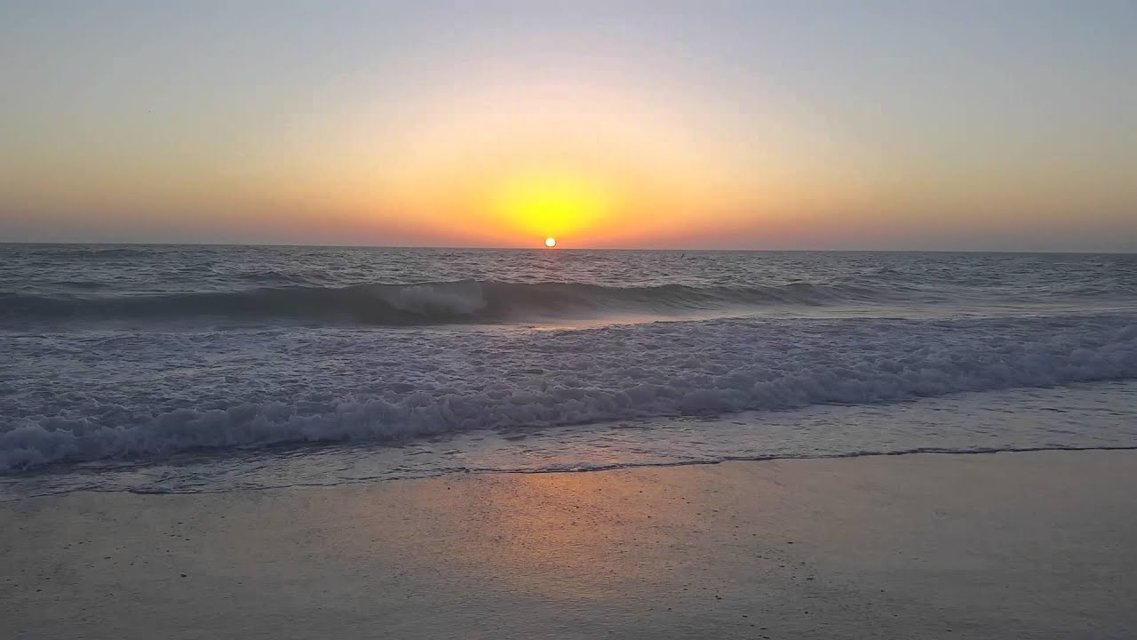 Beautiful, windy sunset at beach. - YouTube