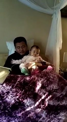 Baby and Daddy catching sunrays - YouTube