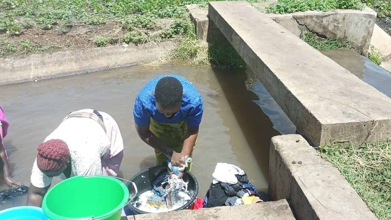 WASHING CLOTHES IN AN AFRICAN VILLAGE RIVER😘 - YouTube