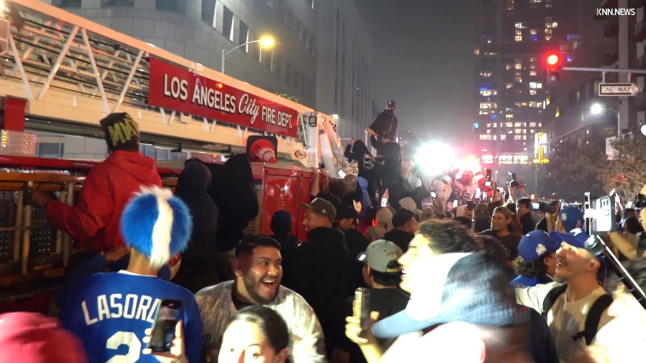 Dodgers Fans Graffiti Bus, Jump Onto Fire Truck in Downtown Los Angeles ...