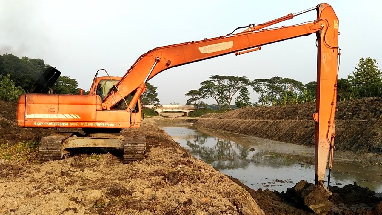 Long Reach Excavator Dredging Canal - YouTube