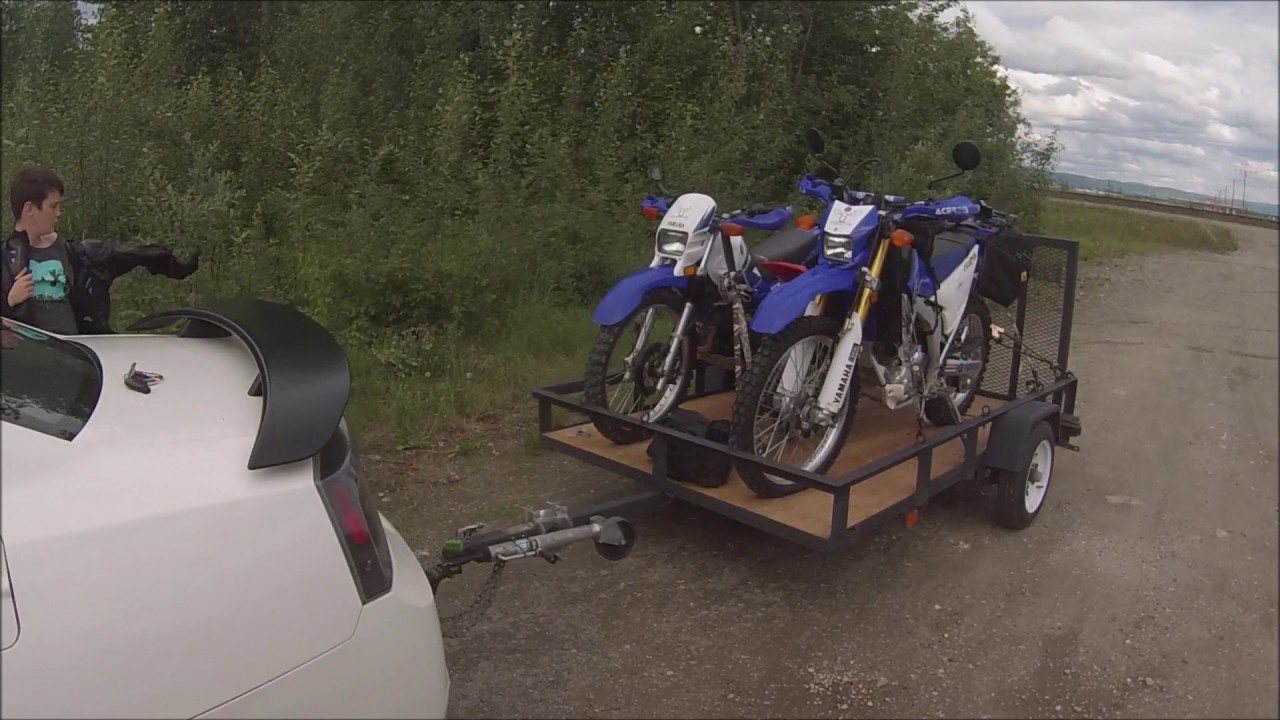 Dodge charger pulling a motorcycle trailer Fairbanks Alaska - YouTube