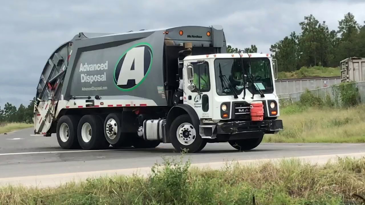 Advanced Disposal Mack MRU Mcneilus Leaving Edmund Landfill - YouTube