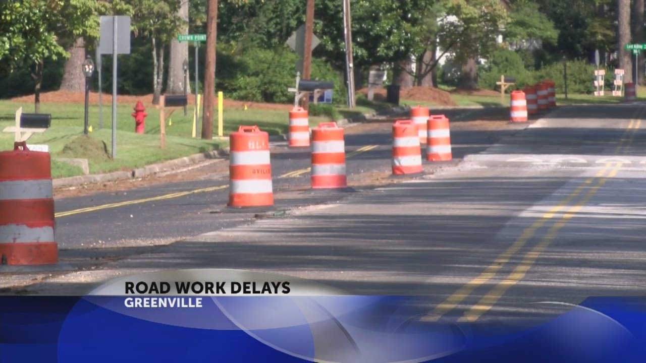 Rainy weather delays road work - YouTube