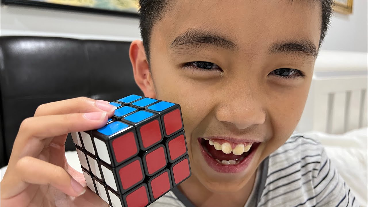 This Young Boy Actually Solves A Rubik’s Cube - YouTube