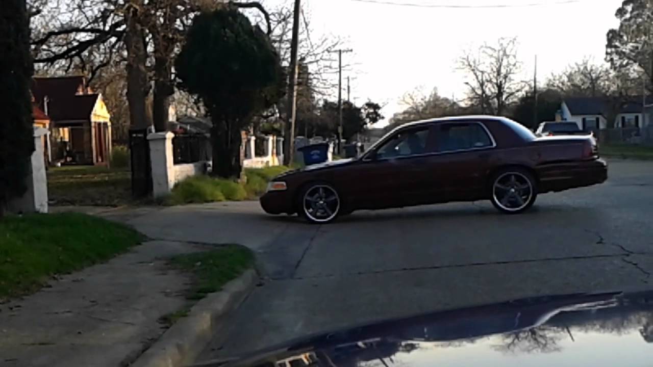 07 crown vic on 20" boss - YouTube