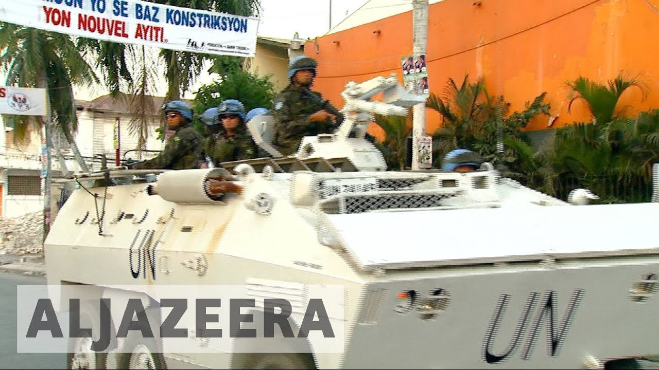 UN peacekeepers pulling out of Haiti with controversial legacy - YouTube