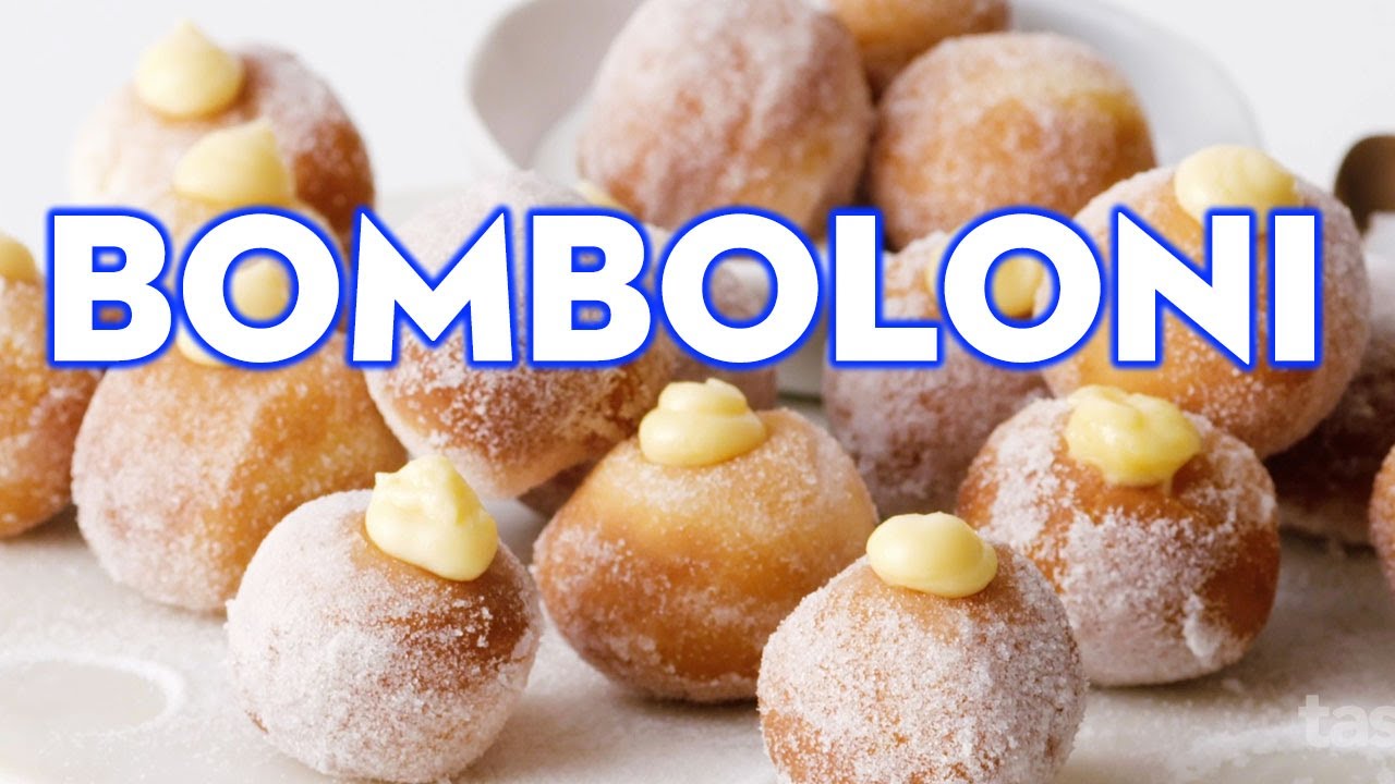 Vanilla cream pastry stuffed Italian doughnuts (Bomboloni) | taste.com ...